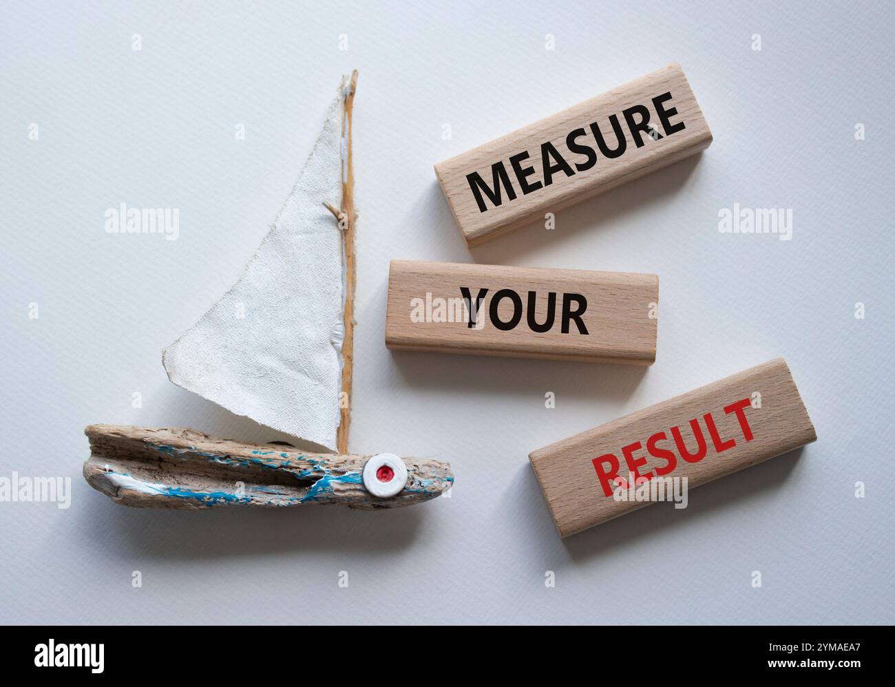 Measure your Result symbol. Concept words Measure your Result on wooden ...