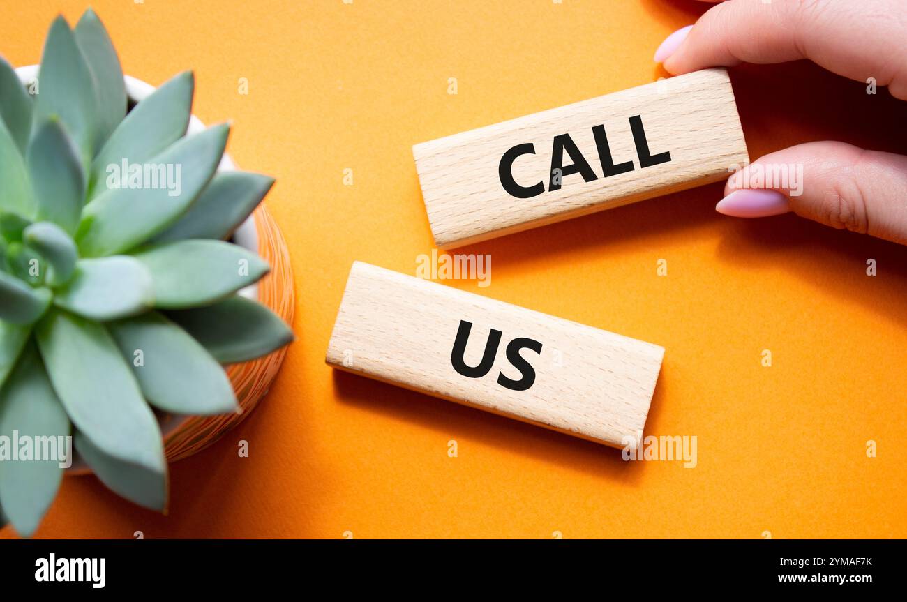 Call Us symbol. Wooden blocks with words Call Us. Beautiful green ...