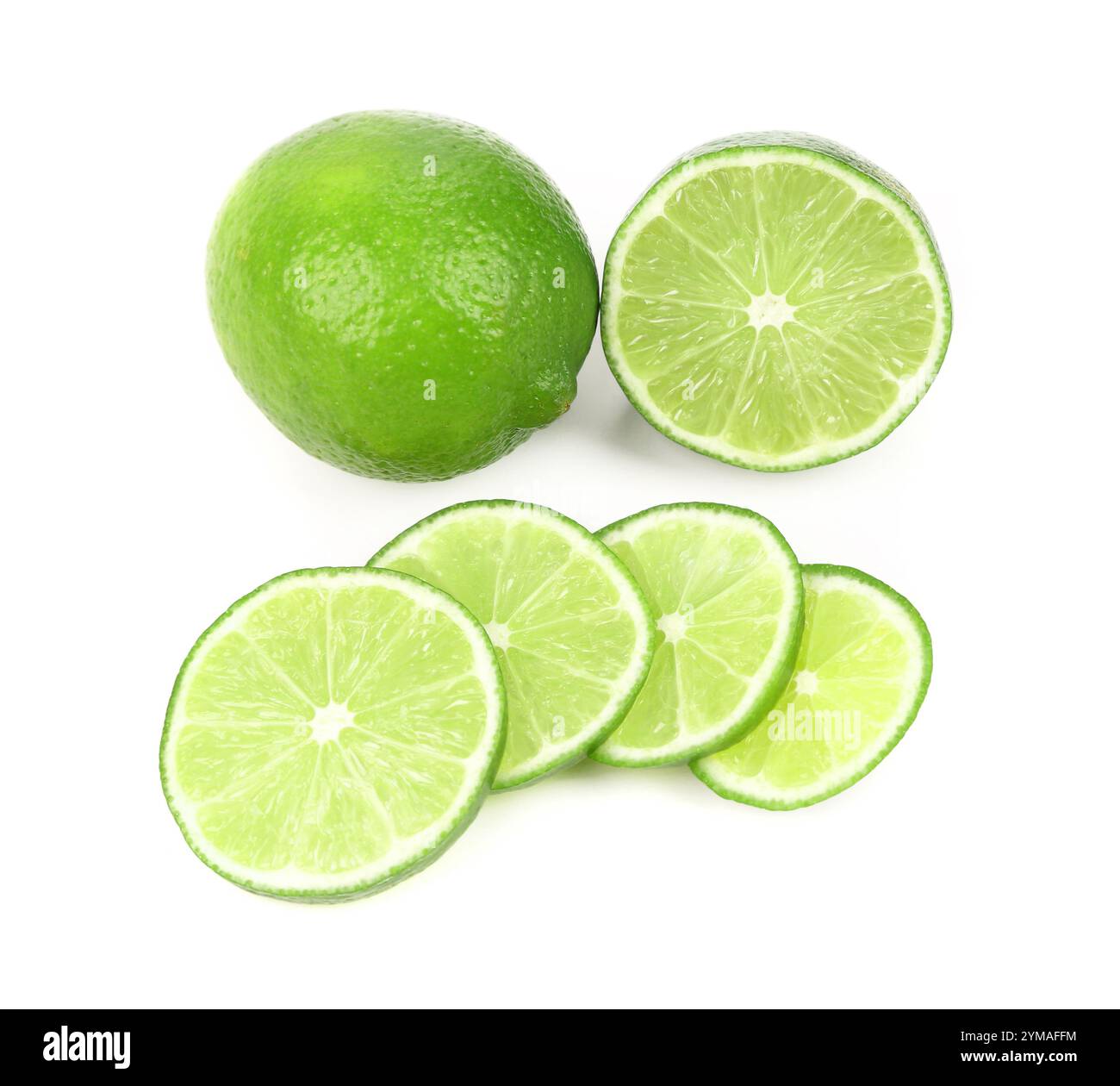 Fresh lime and slices. Close up. White background Stock Photo - Alamy