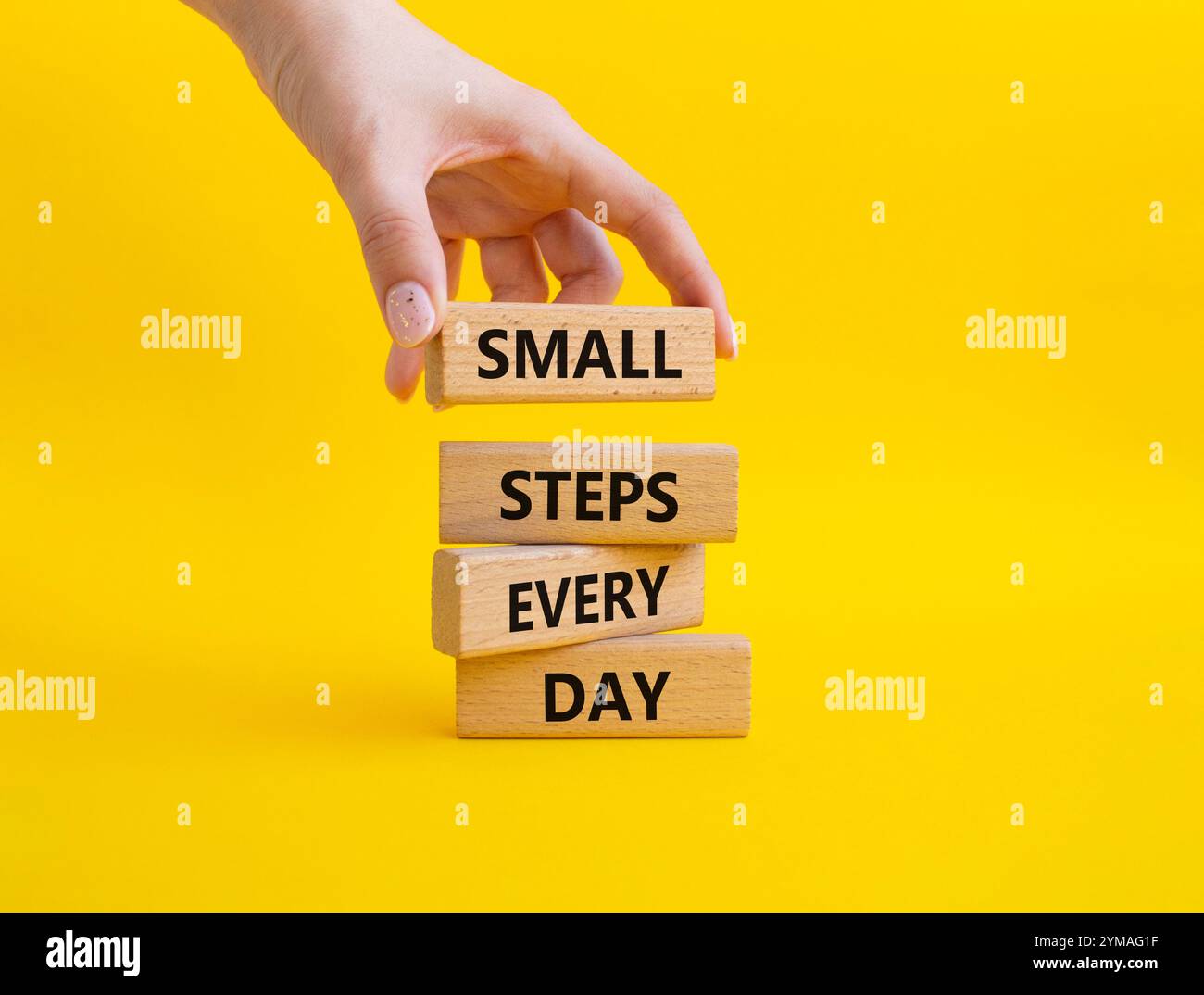 Small Steps Every Day symbol. Wooden blocks with words Small Steps ...