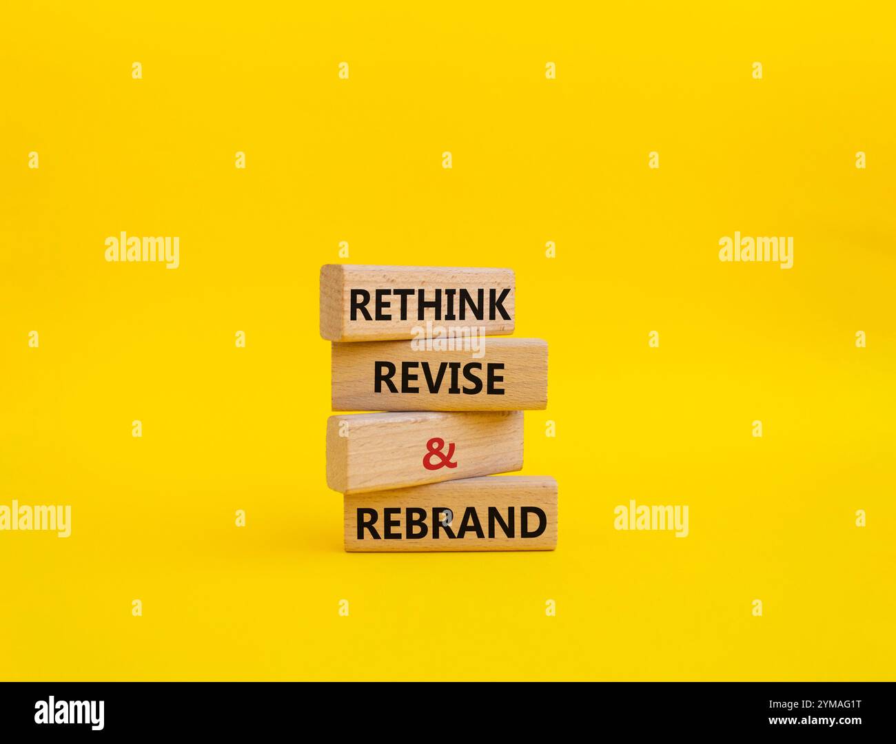 Rethink Revise and Rebrand symbol. Wooden blocks with words Rethink Revise and Rebrand ...