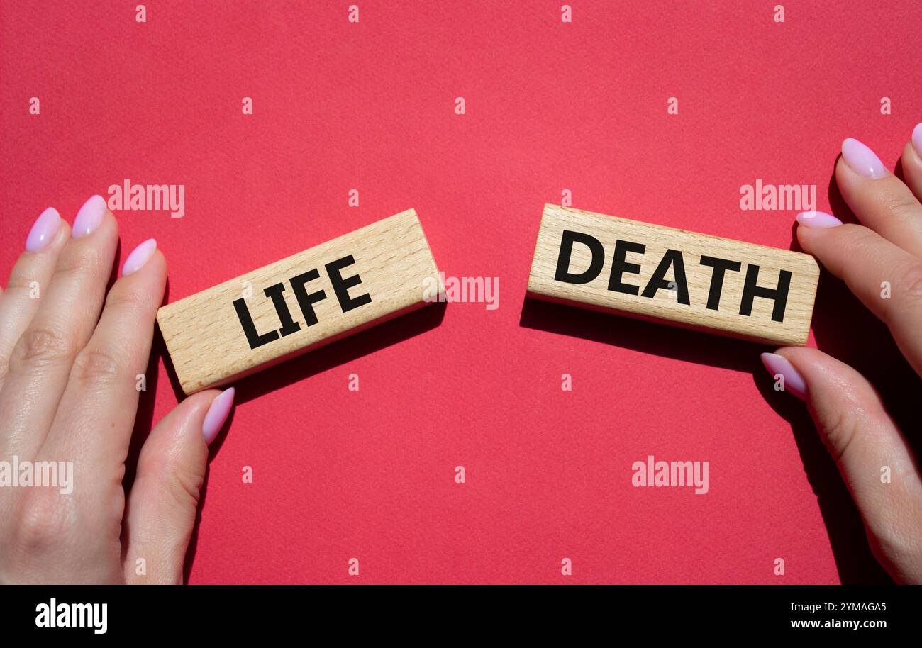 Life or Death symbol. Concept word Life or Death on wooden blocks ...