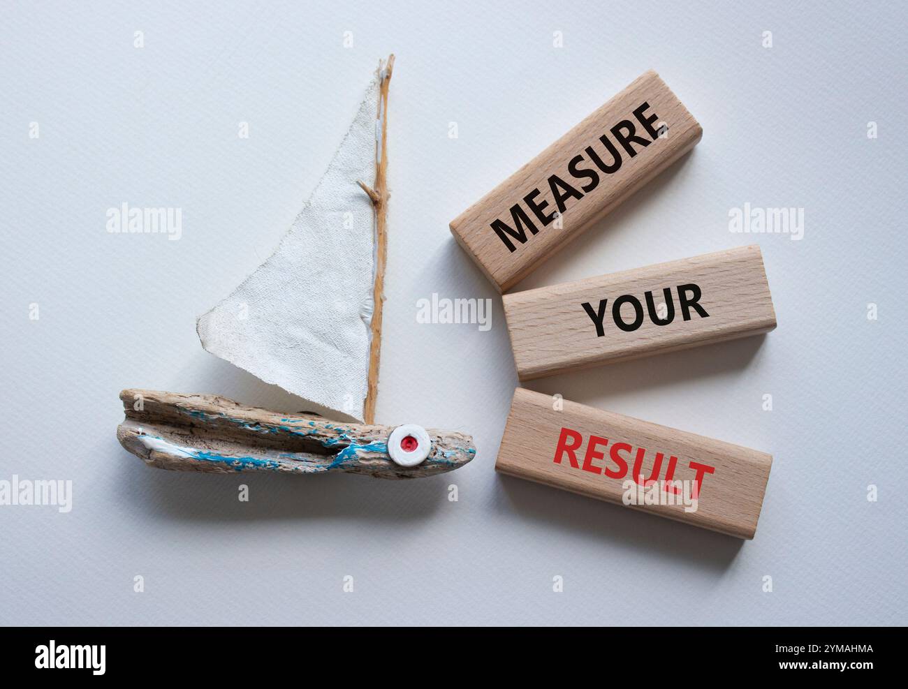 Measure your Result symbol. Concept words Measure your Result on wooden ...