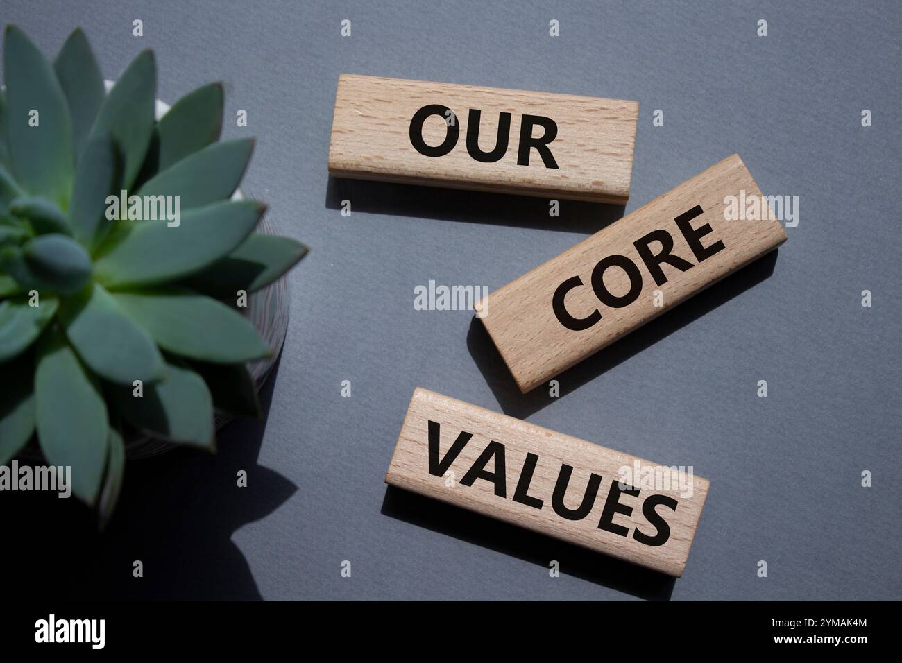 Our core values symbol. Concept words Our core values on wooden blocks ...