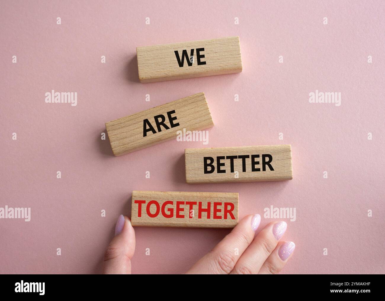 We are better together symbol. Wooden blocks with words We are better ...