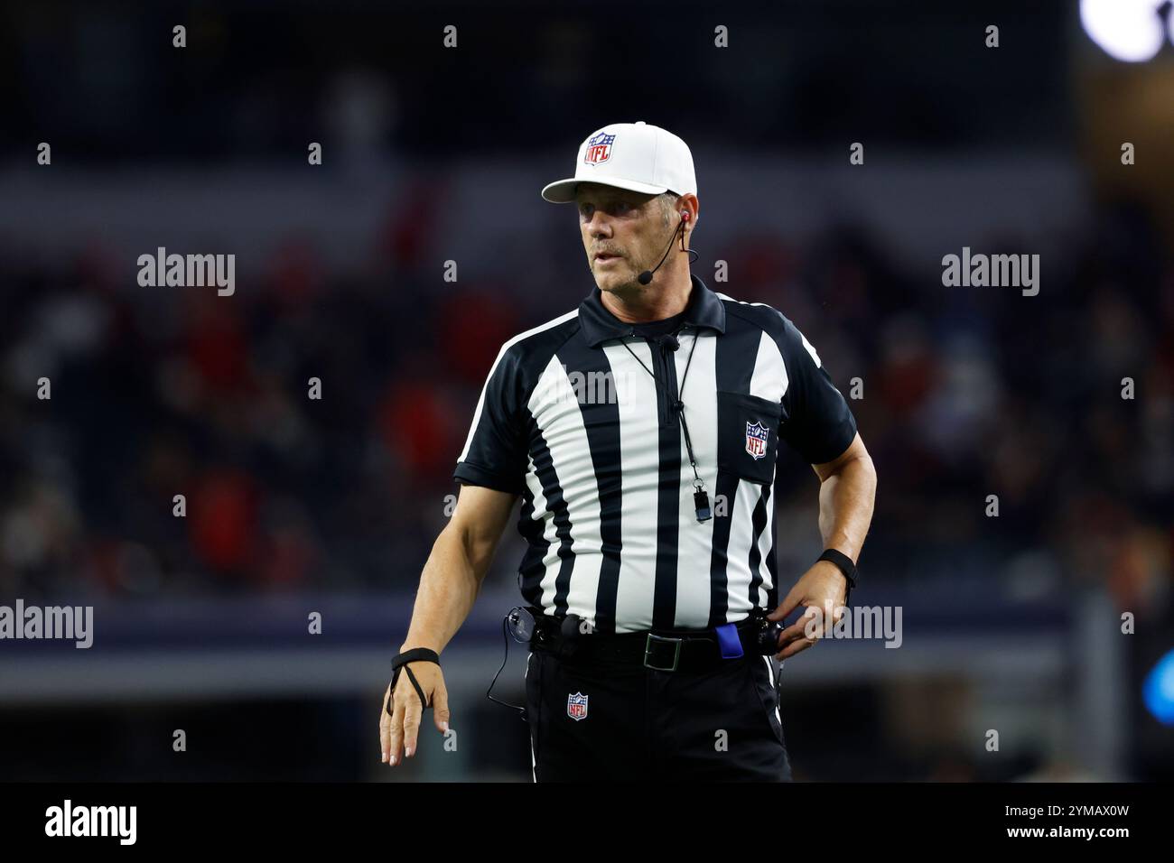 NFL official, referee Craig Wrolstad (4) watches during an NFL football ...
