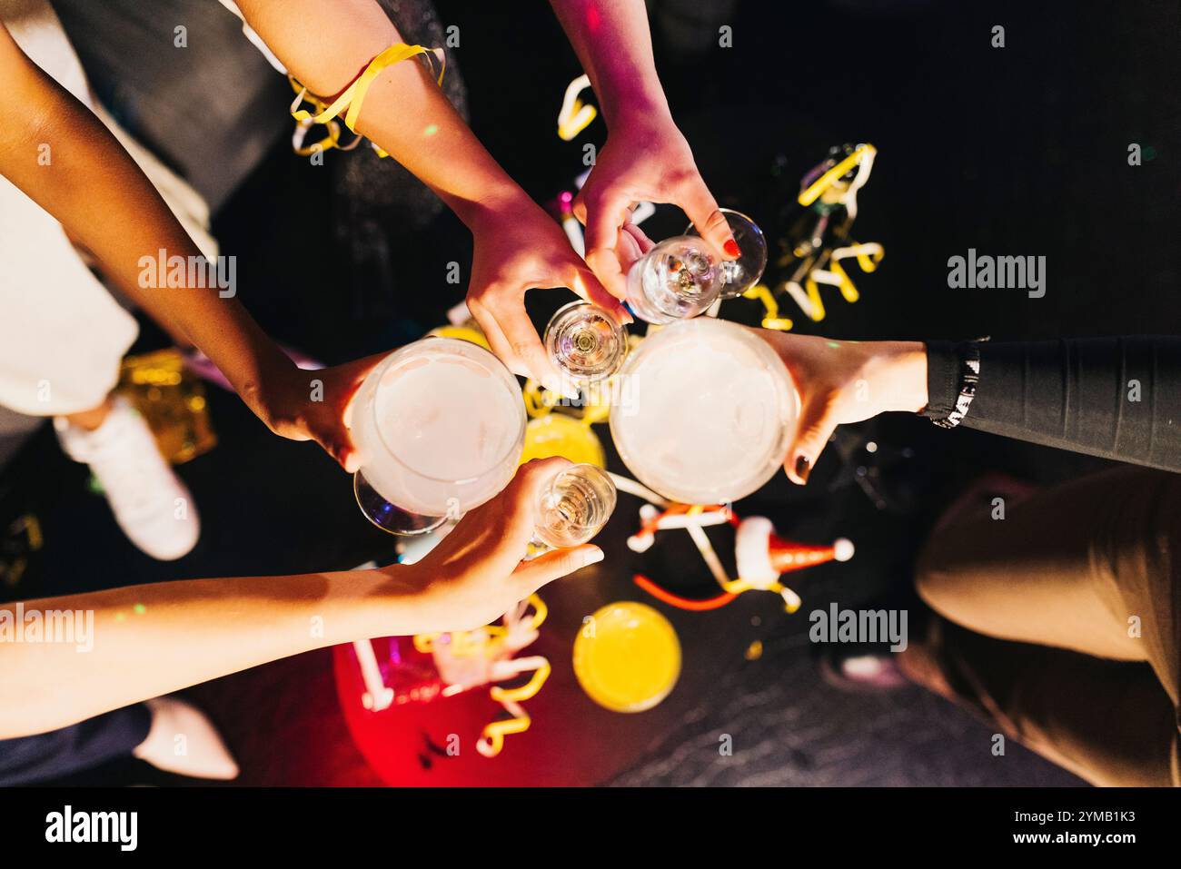 Top view people raising glasses hi-res stock photography and images - Alamy