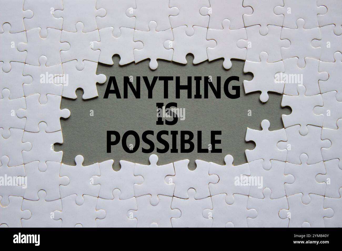 Anything is Possible symbol. White puzzle with words Anything is ...