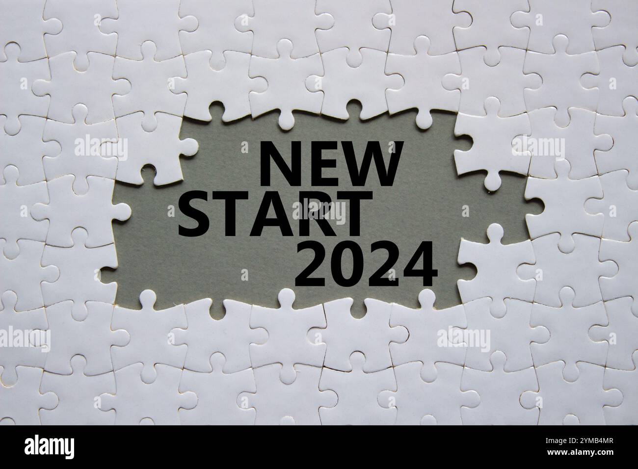 New Start 2024 symbol. Concept words New Start 2024 on white puzzle ...