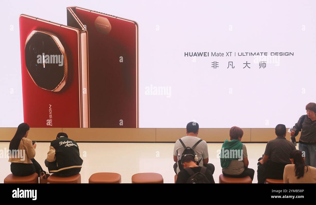 Huawei's first triple foldable screen phone Mate XT is displayed at ...