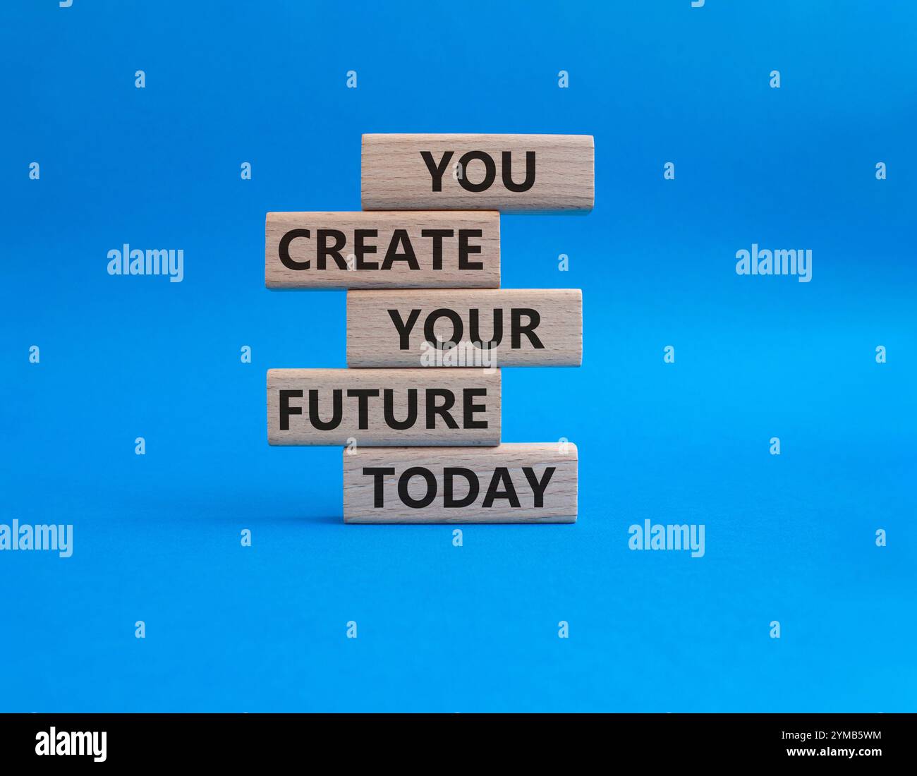 Future and development symbol. Wooden blocks with words You Create your ...