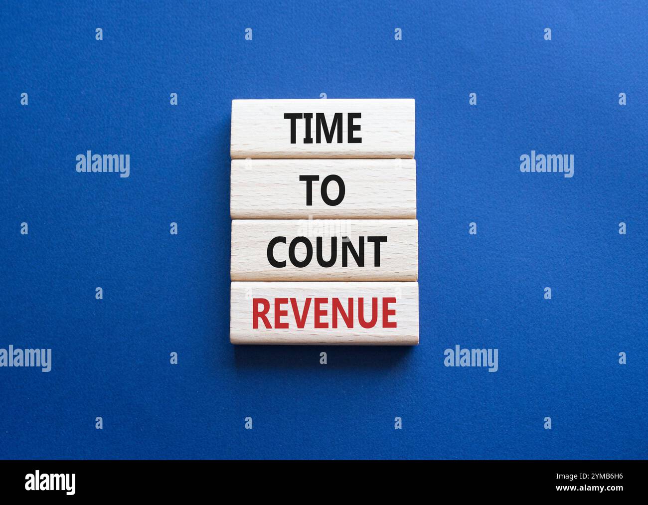 Time to count Revenue symbol. Wooden blocks with words Time to count ...