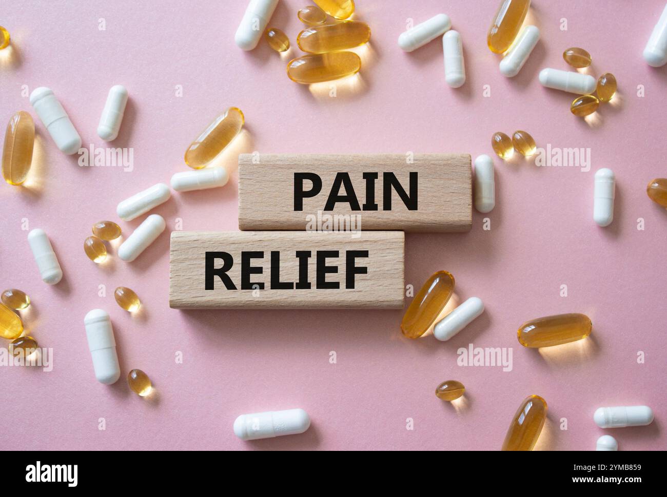 Pain Relief symbol. Concept word Pain Relief on wooden blocks ...