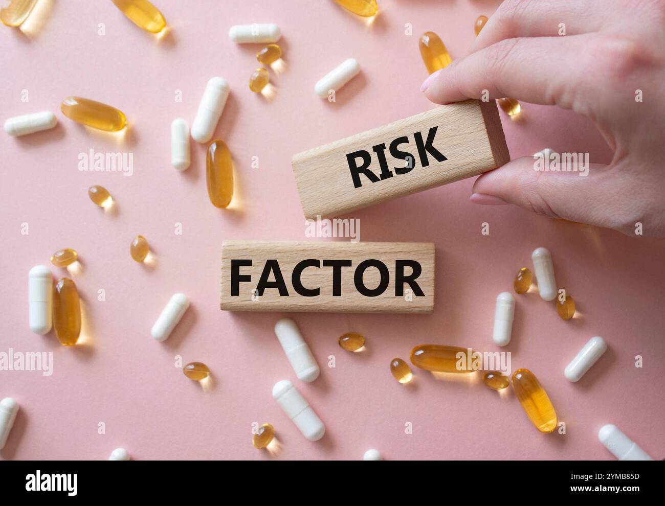 Risk Factor symbol. Concept word Risk Factor on wooden blocks ...