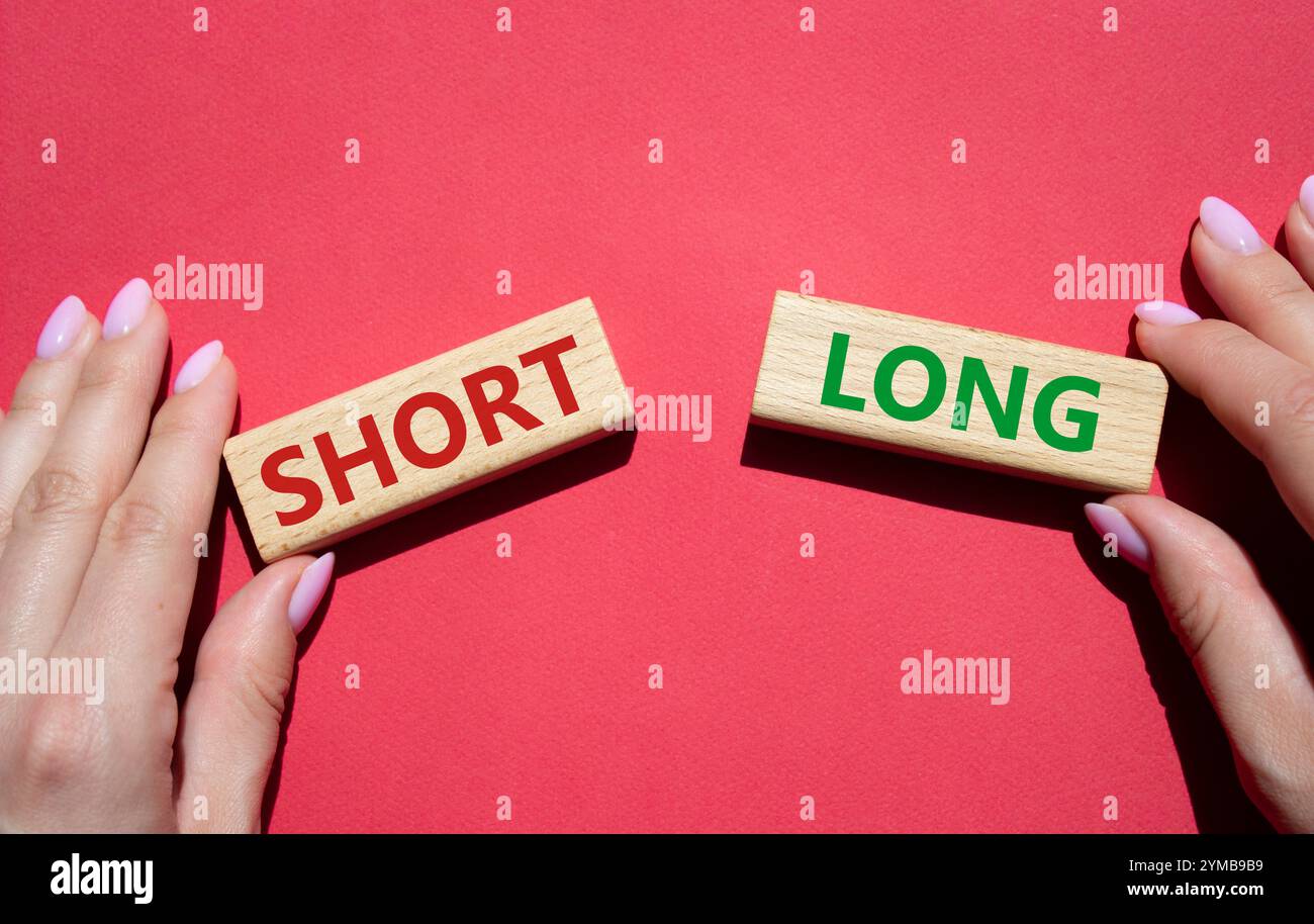 Short vs Long symbol. Concept word Short vs Long on wooden blocks ...