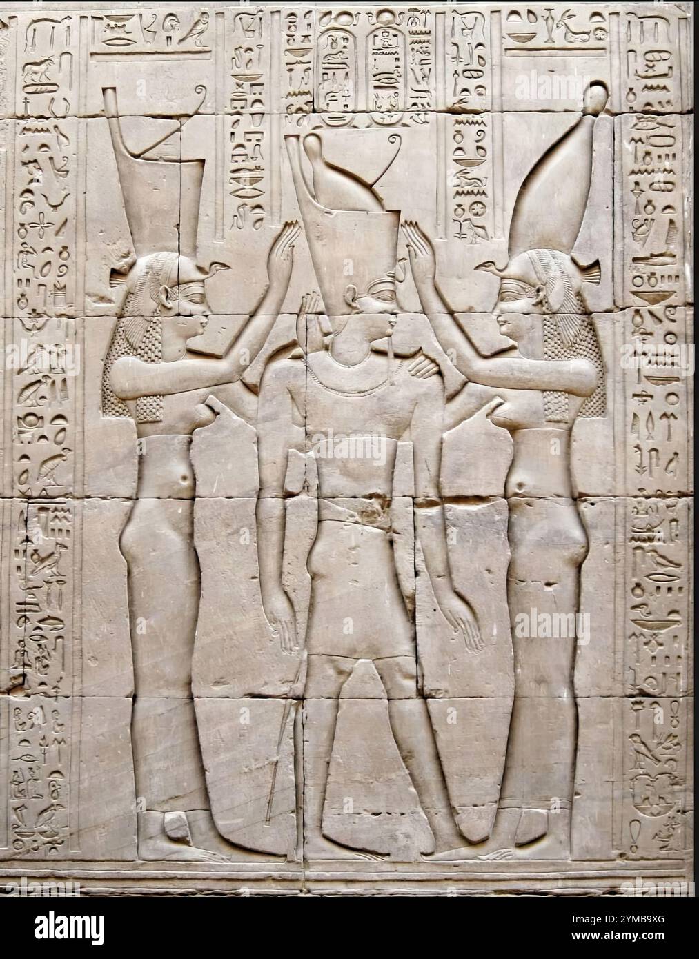 7453. Pharoah Ptolemy VIII between the goddesses Wadjet (symbolizing ...
