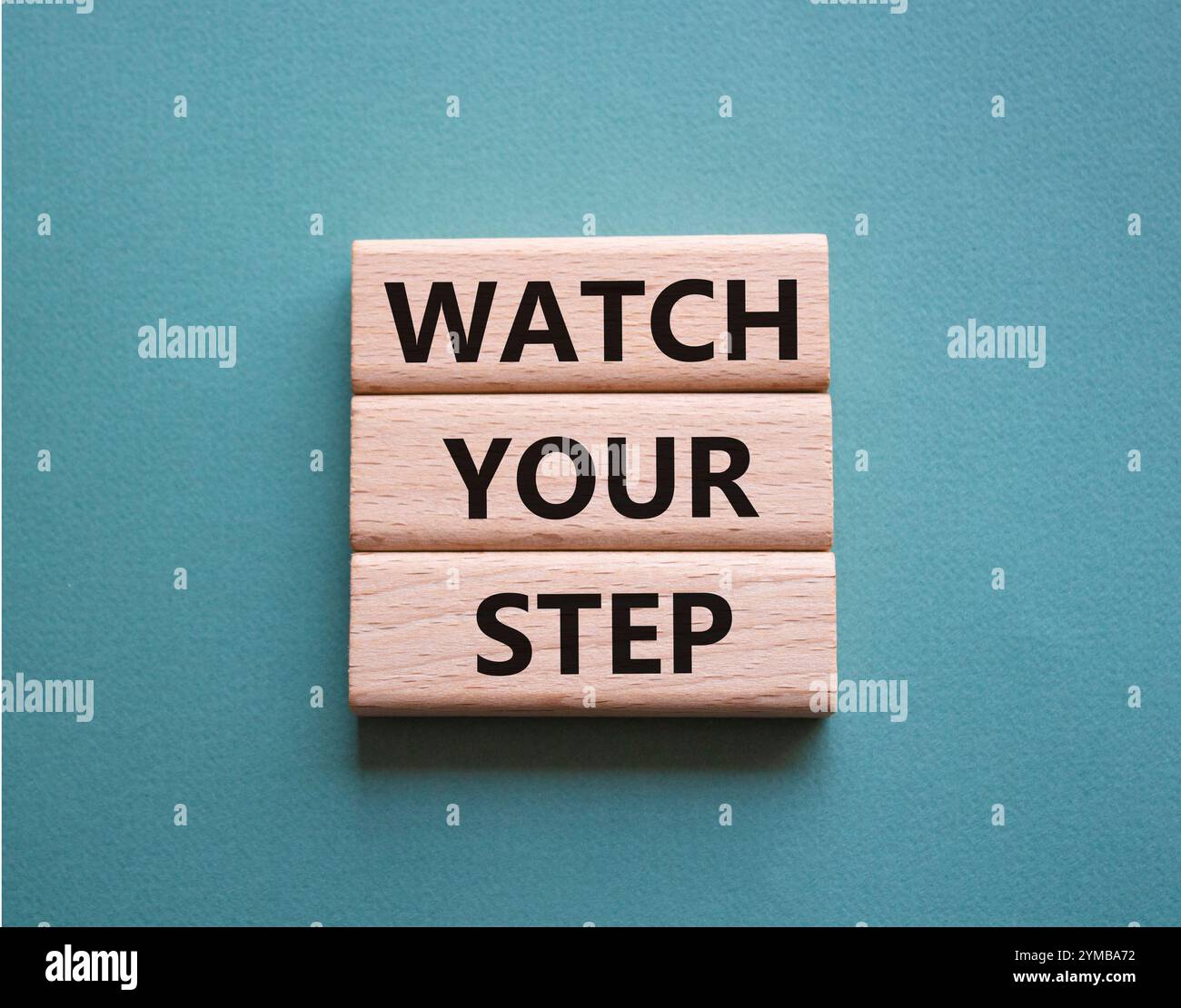 Watch your Step symbol. Concept words Watch your Step on wooden blocks ...