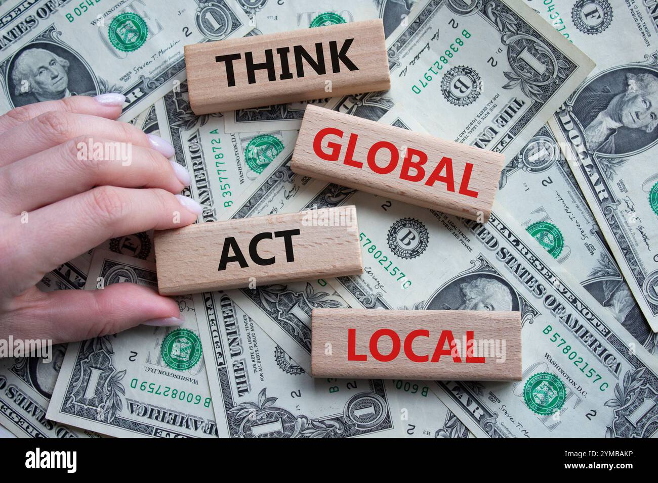 Think global act local symbol. Wooden blocks with words Think global ...