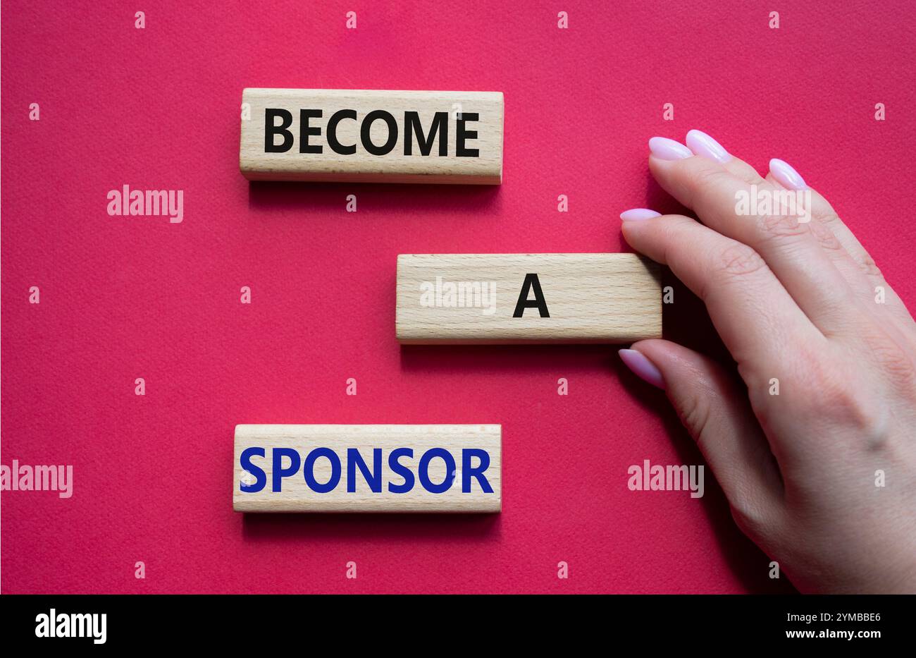 Become a sponsor symbol. Concept word Become a sponsor on wooden blocks ...