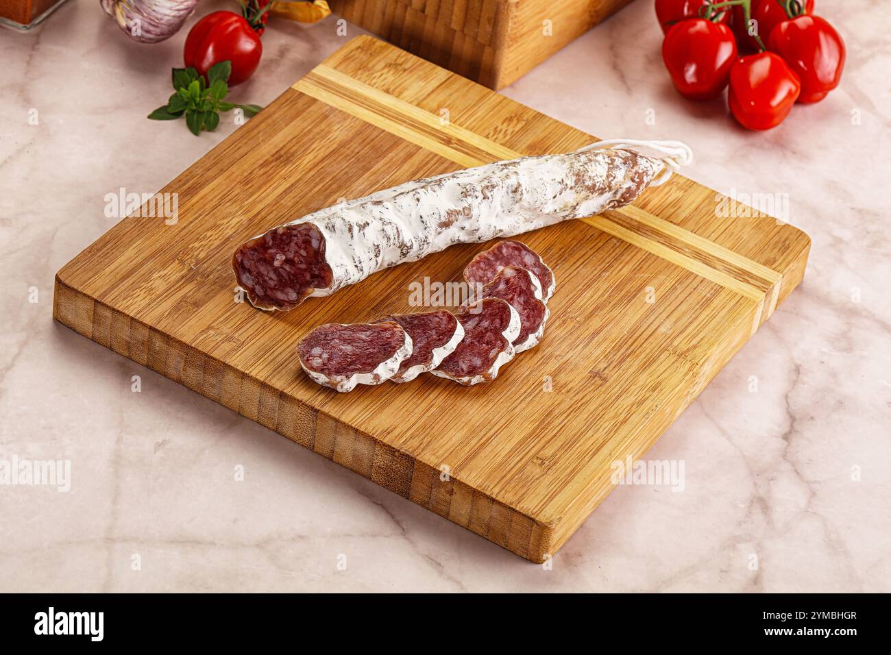 Spanish dry pork salami sausage Fuet Stock Photo - Alamy