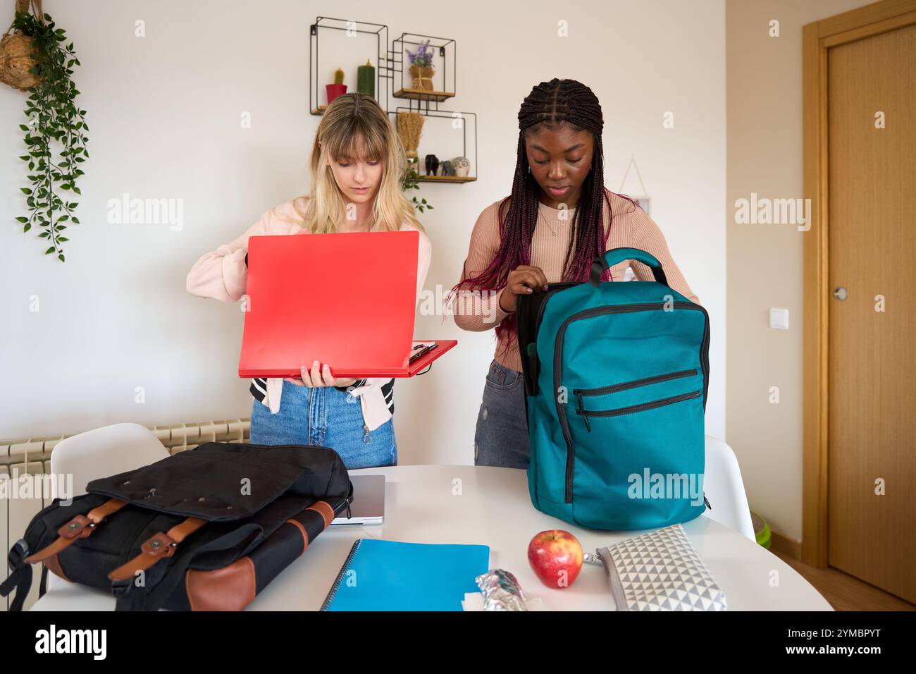Backpacks classroom table hi-res stock photography and images - Alamy