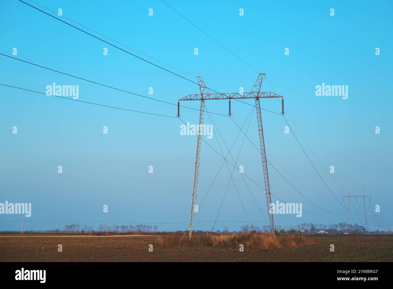 Electricity pylon transmission towers and electrical wires, selective ...
