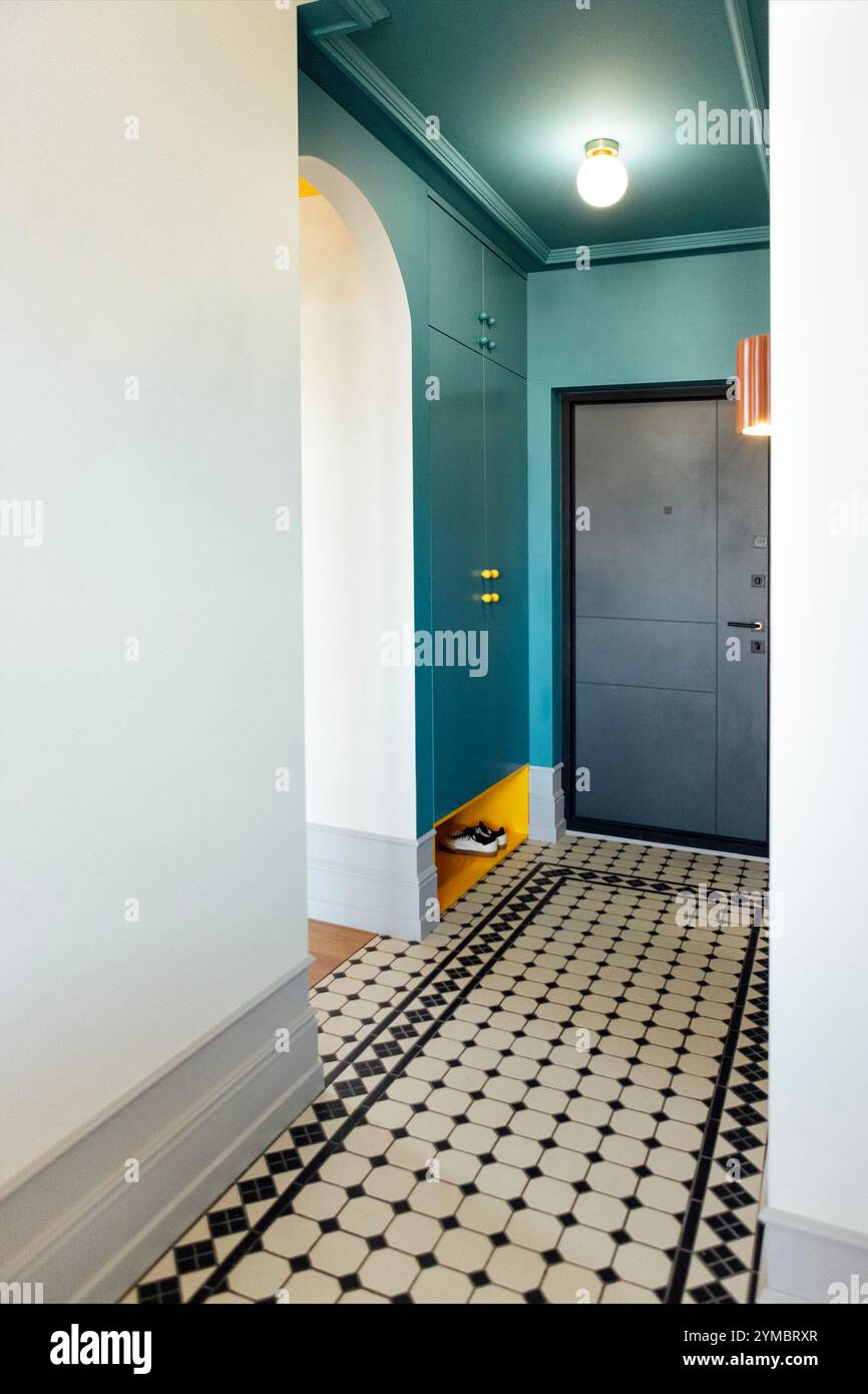 The front door and the hallway. Stylish and elegant interior of the ...