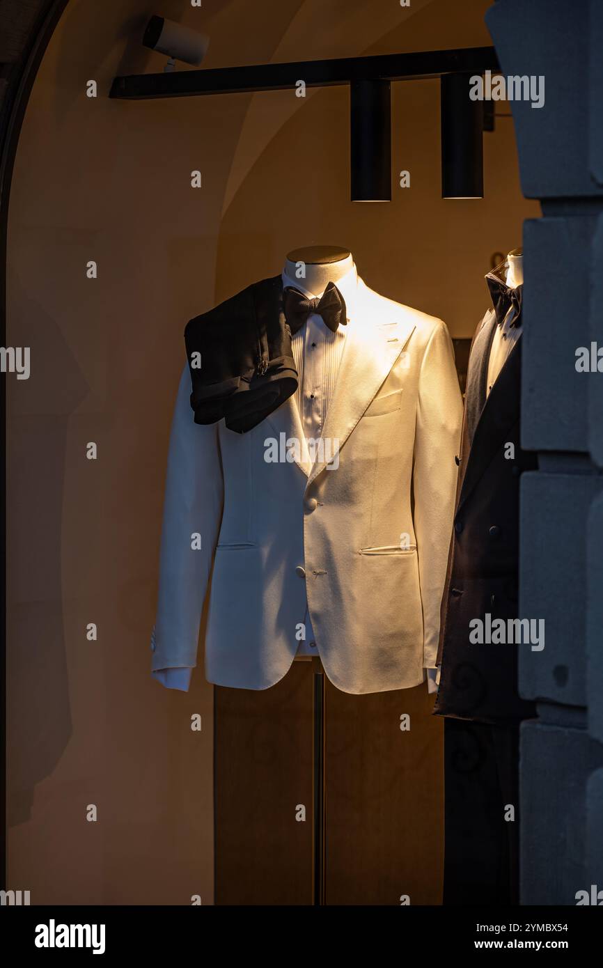 Male mannequin in store glass window display dressed in elegant autumn ...