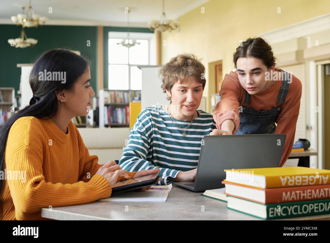 Discussing Strategies for Successful Group Project Completion Stock Photo - Alamy