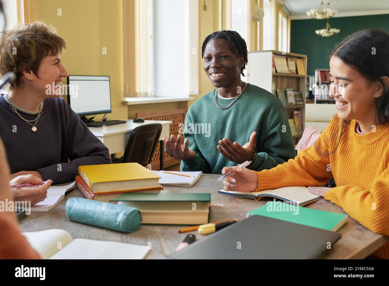 Collaborative Students Sitting in Classroom Learning Together Stock ...