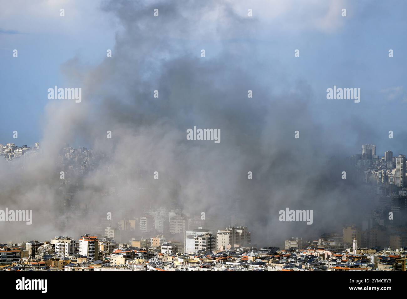 Smoke rises after an Israeli airstrike on Dahiyeh, in the southern ...