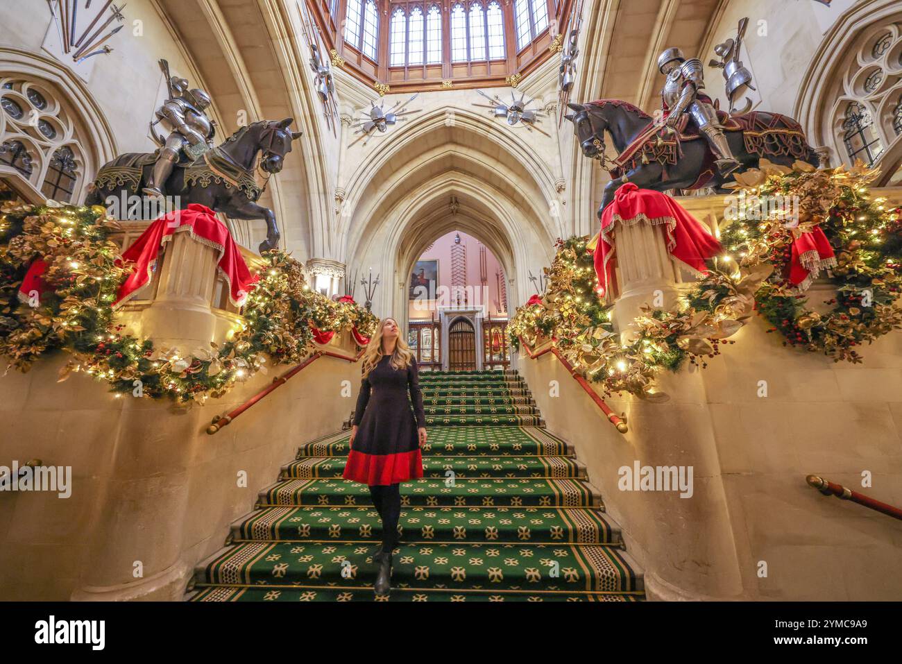 Windsor Castle, Berkshire, UK. , . A staff memeber looking at the ...