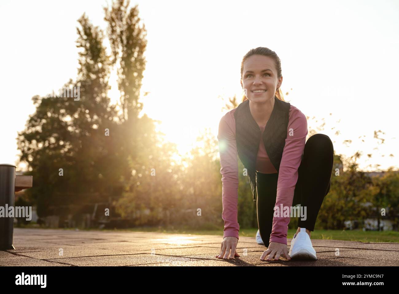 Woman doing outdoor exercises hi-res stock photography and images - Alamy