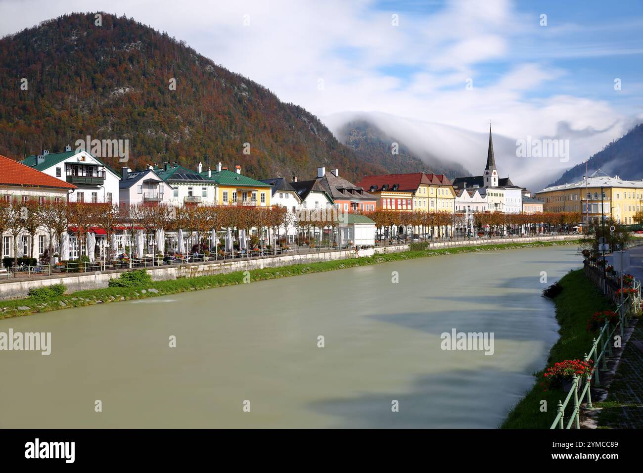 The river Traun with its esplanade and heritage buildings in Bad Ischl ...