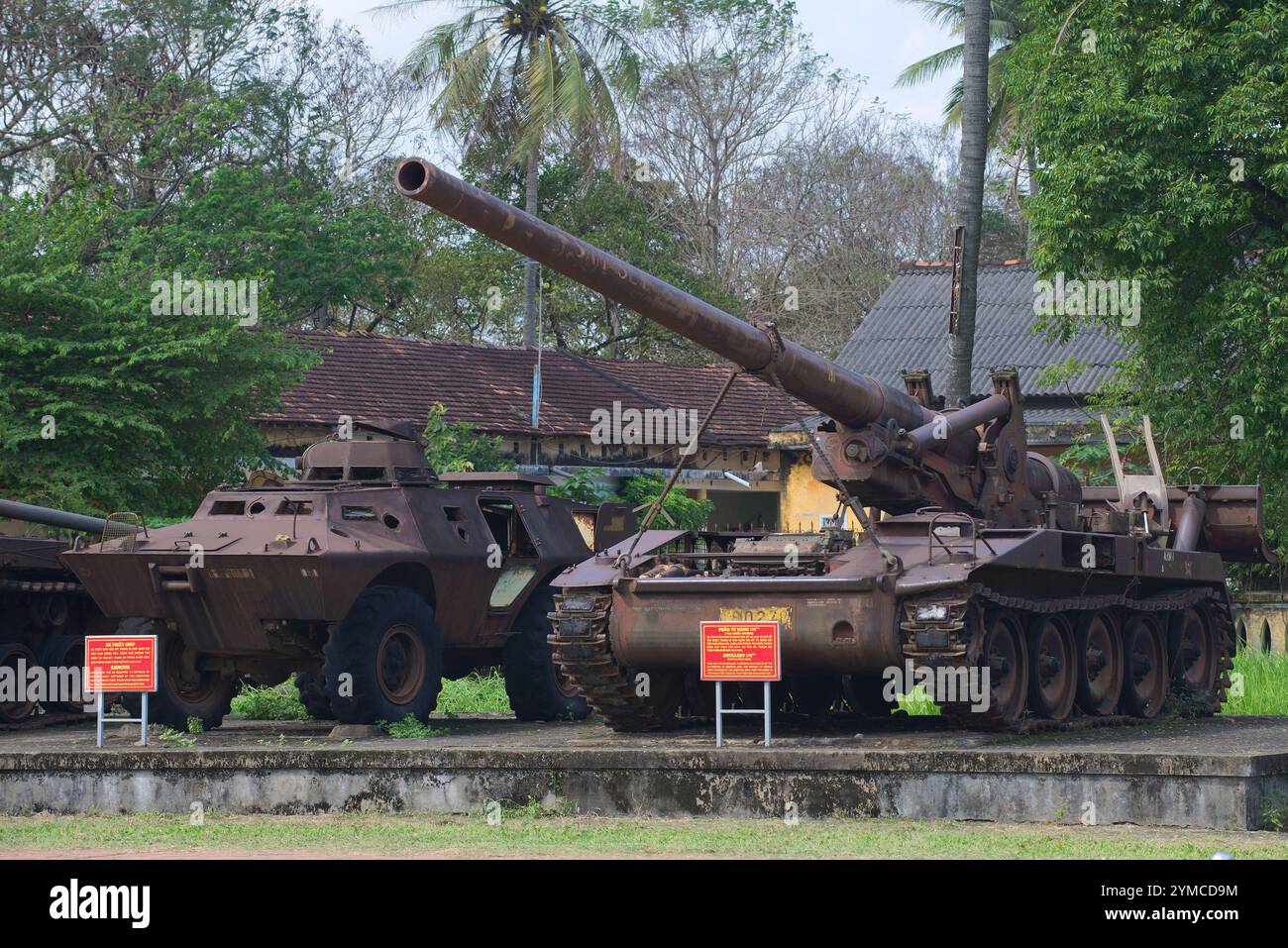 HUE, VIETNAM - JANUARY 08, 2016: Armored personnel carrier and 175mm ...