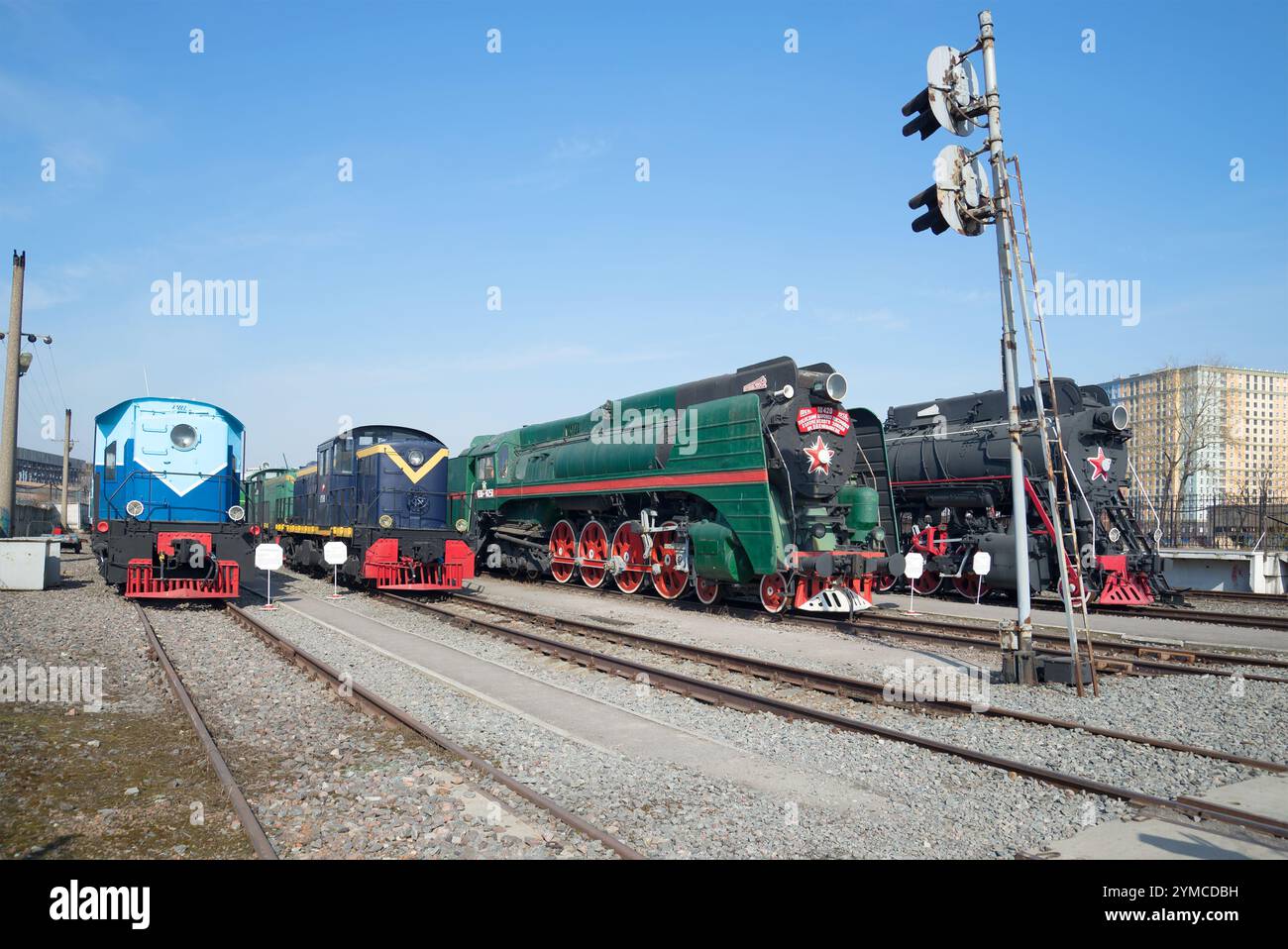 SAINT PETERSBURG, RUSSIA - MARCH 30, 2016: Shunting locomotives and two ...