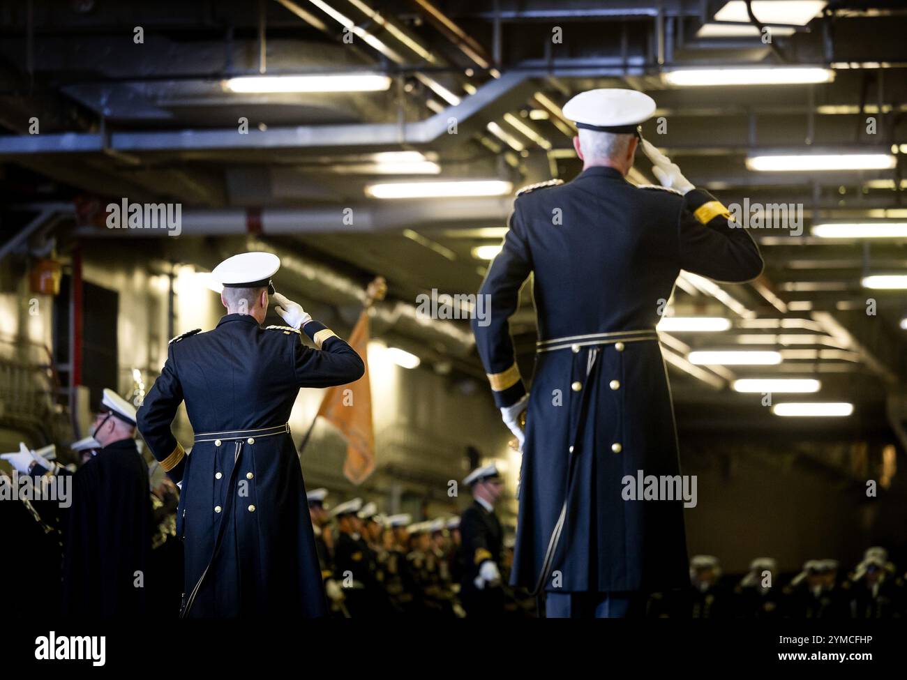DEN HELDER - Commander George Pastoor (L) and rank mate Arjen Warnaar ...