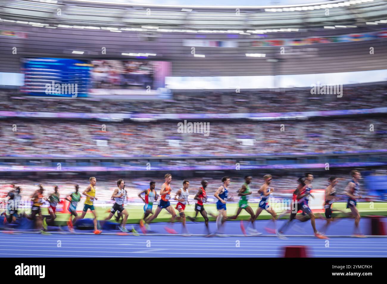 Image of Runners in motion in the 5000 meters at the Paris 2024 Olympic ...
