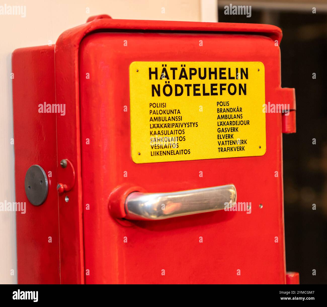 An old red Helsinki outdoor emergency telephone box , labelled in ...