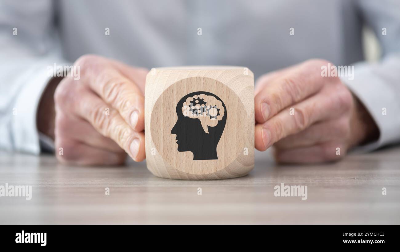 Wooden block with symbol of knowledge concept Stock Photo - Alamy