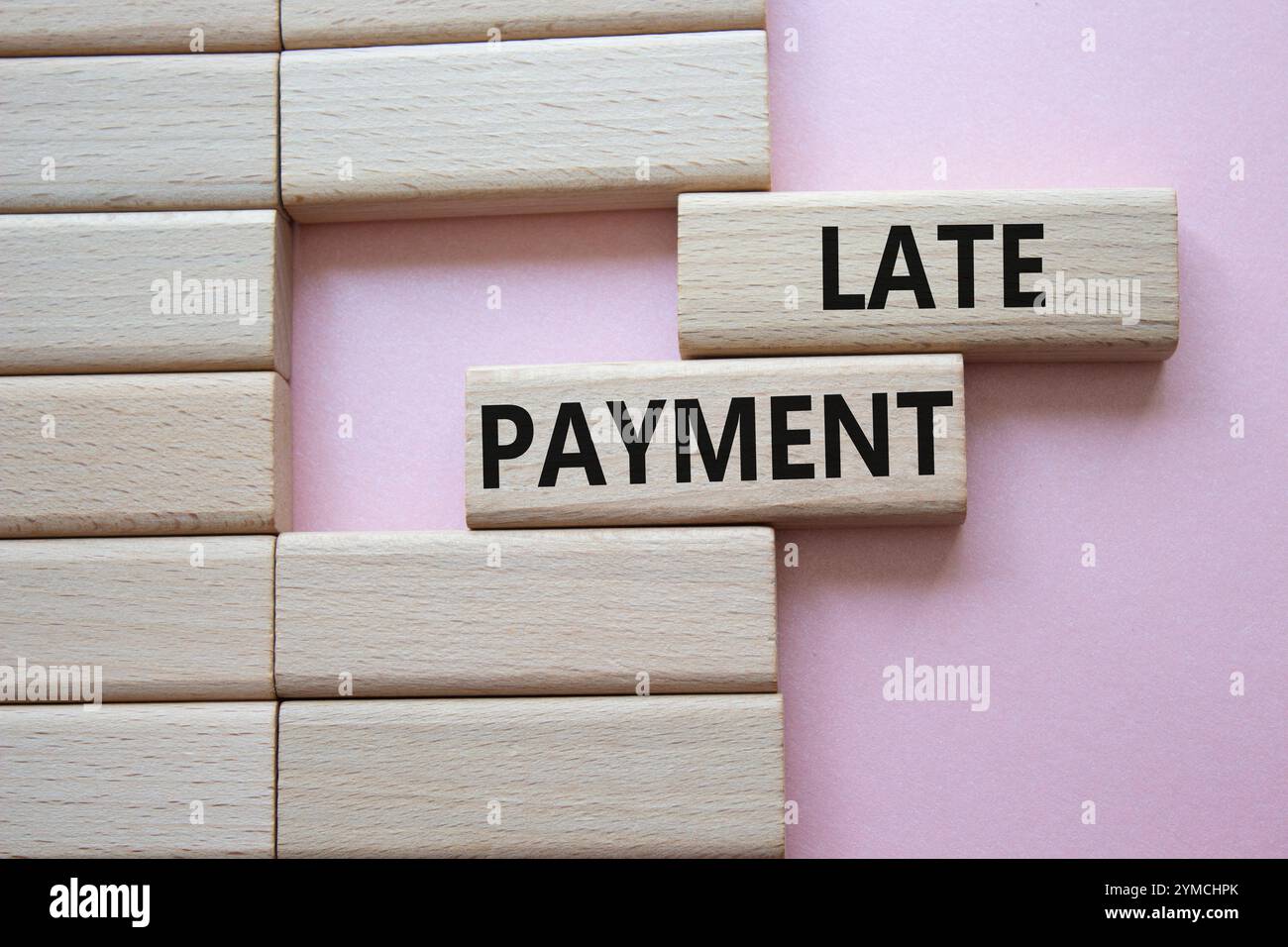Late payment symbol. Concept word Late payment on wooden blocks ...