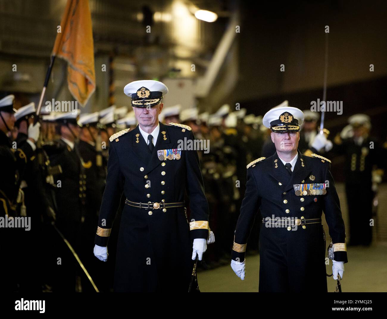 DEN HELDER - Commander George Pastoor (R) and rank mate Arjen Warnaar ...