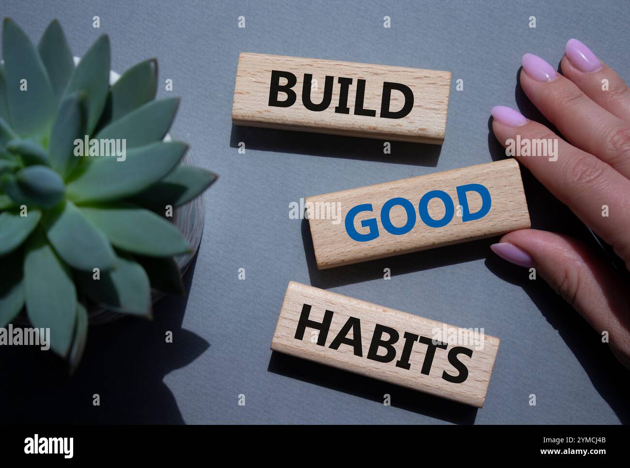 Build good habits symbol. Wooden blocks with words Build good habits ...
