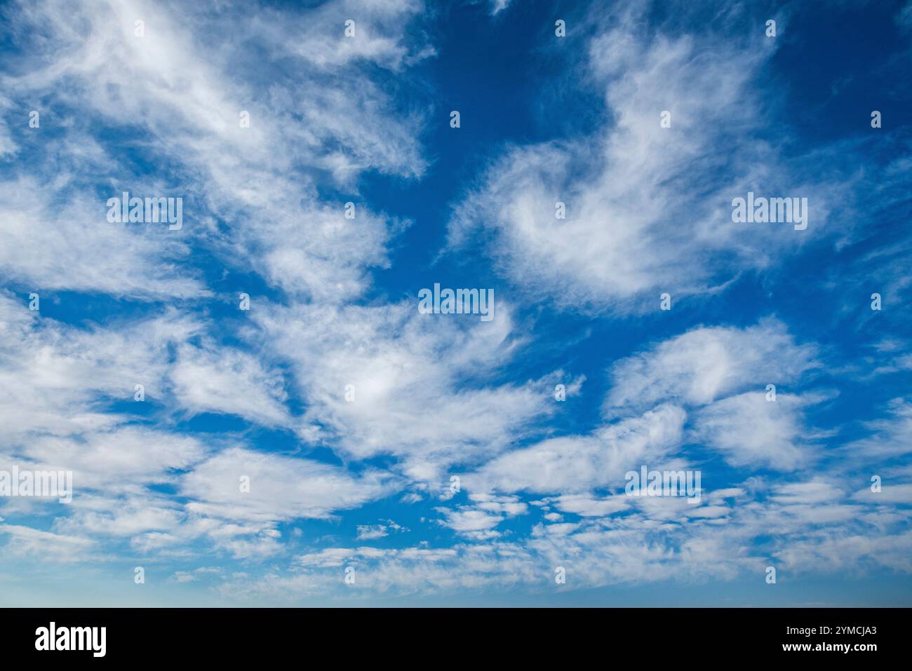 Puffy white clouds against blue hi-res stock photography and images - Alamy