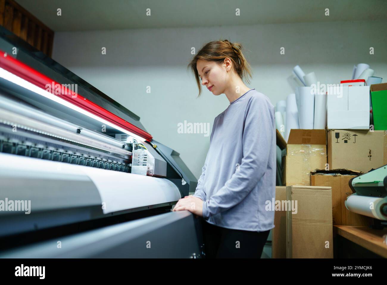Woman working in printing hi-res stock photography and images - Alamy
