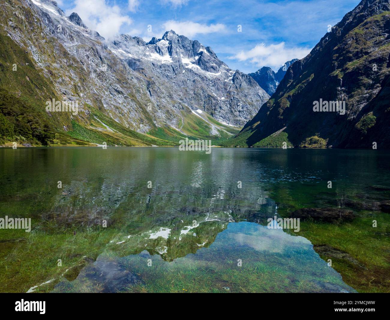 Zealand fiordland lake reflection hi-res stock photography and images ...