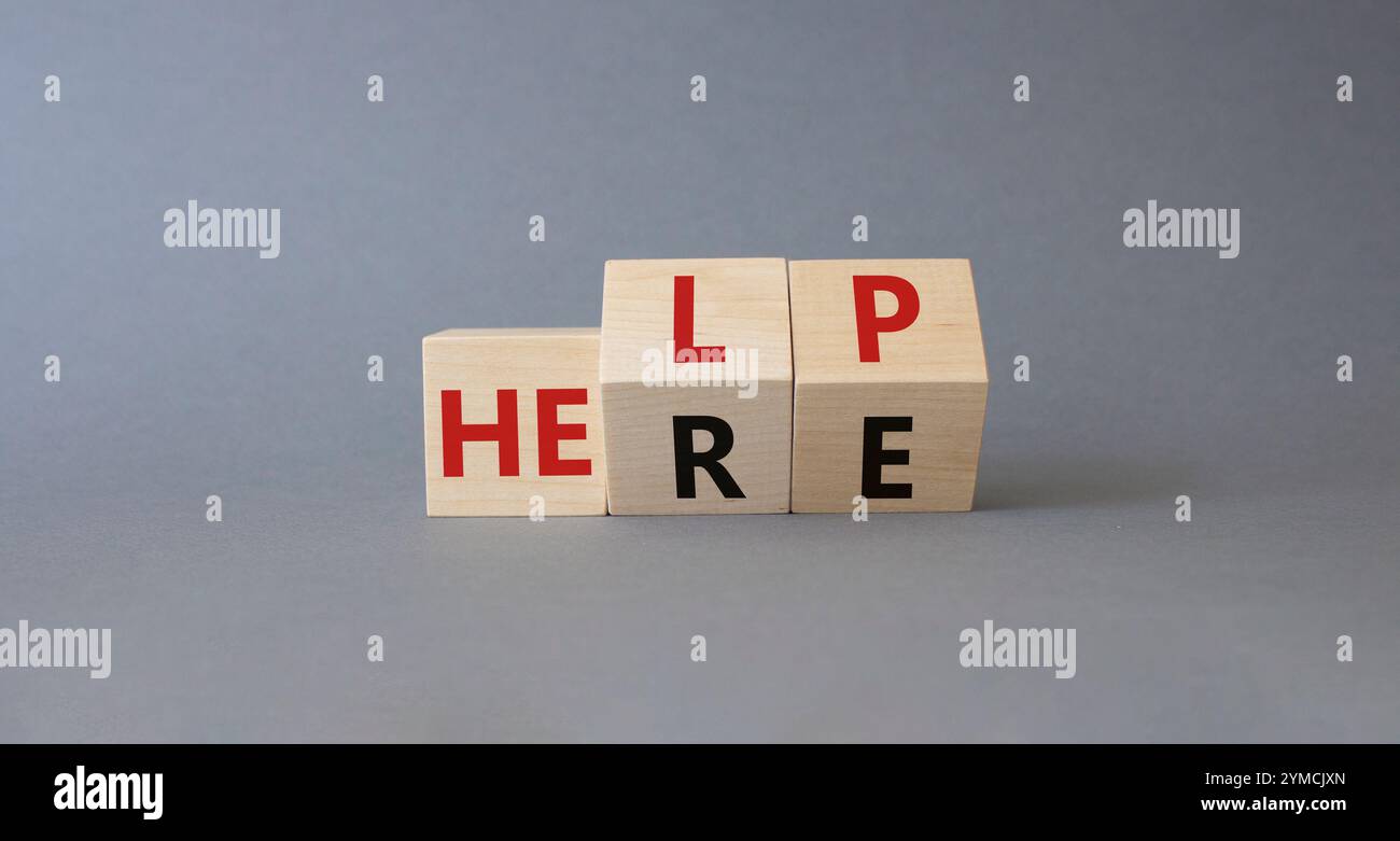 Help is here symbol. Turned wooden cubes with words Here to Help ...