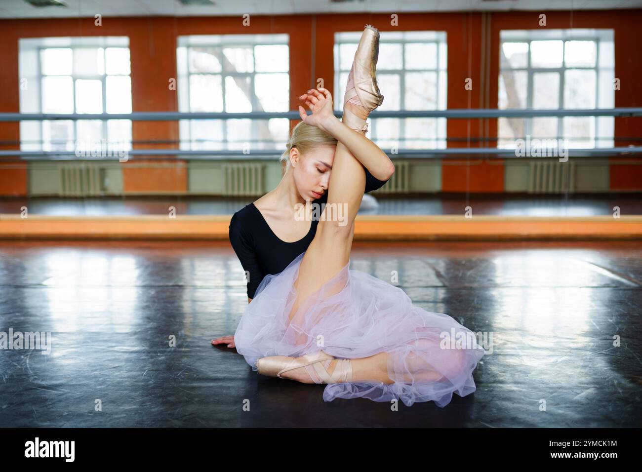 Ballerina sitting on floor hi-res stock photography and images - Alamy