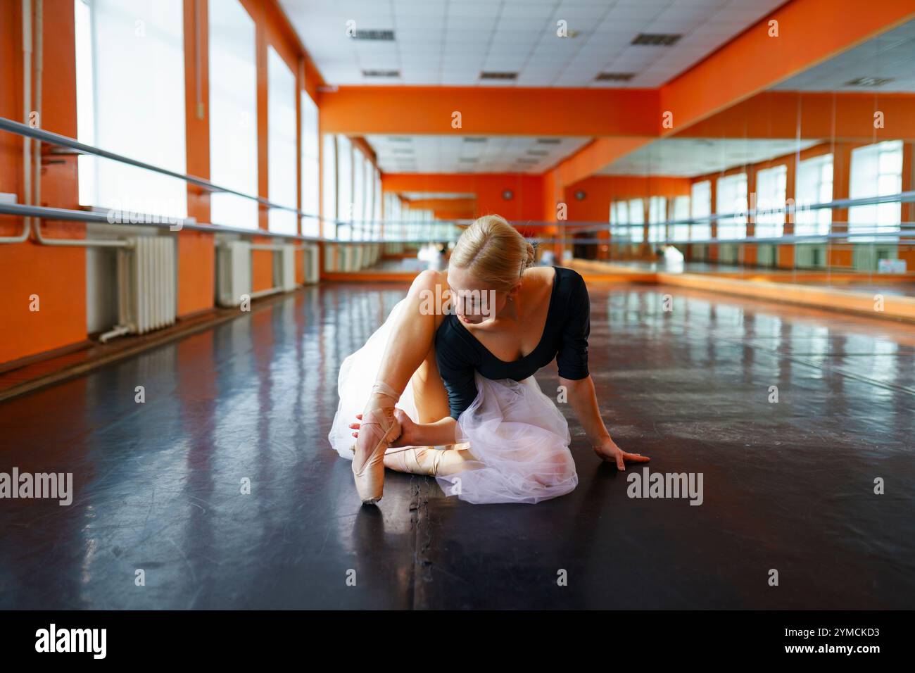 Young ballet dancer sitting hi-res stock photography and images - Alamy