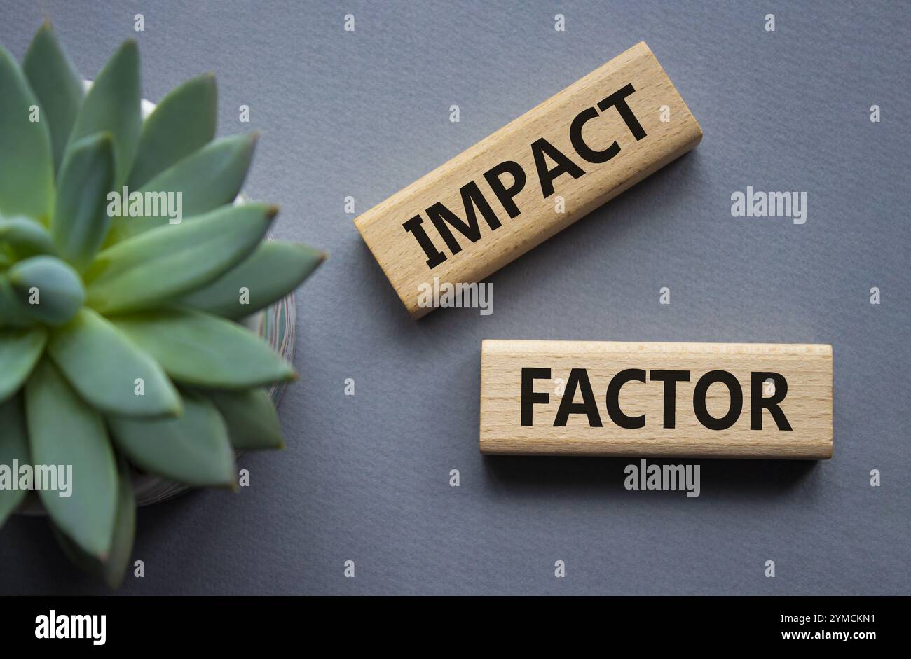 Impact Factor symbol. Wooden blocks with words Impact Factor. Beautiful ...
